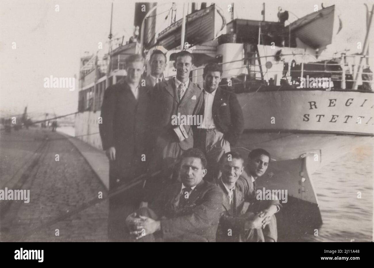 vintage monochrome photograph about a group of friends whose are posing ...