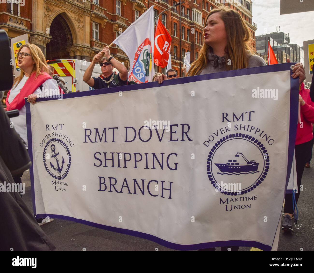 London, England, UK. 21st Mar, 2022. Protesters march with a 'RMT Dover ...