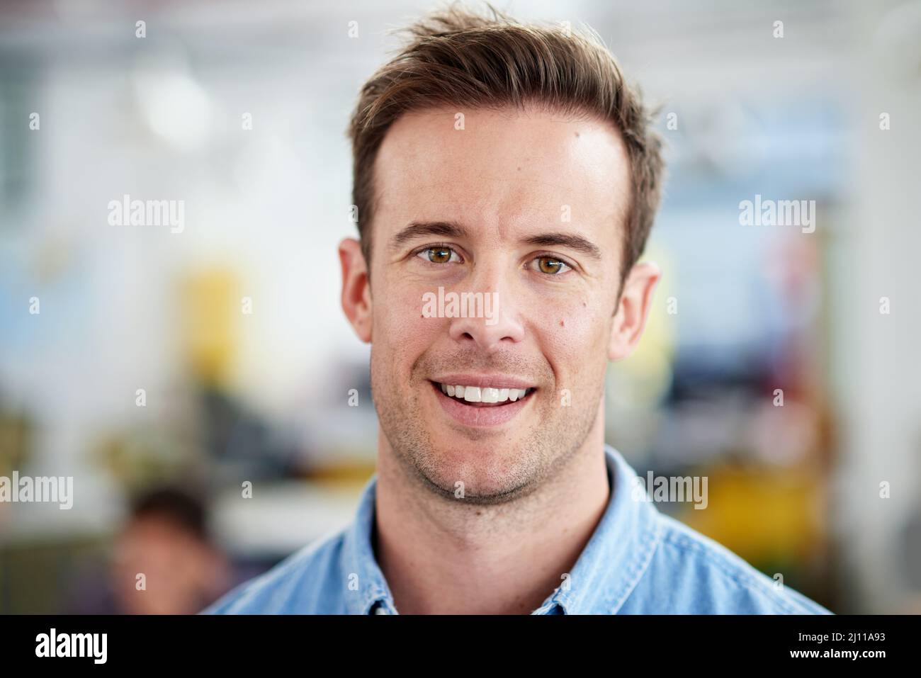 Success is a smile away. Portrait of smiling man in a casual work ...