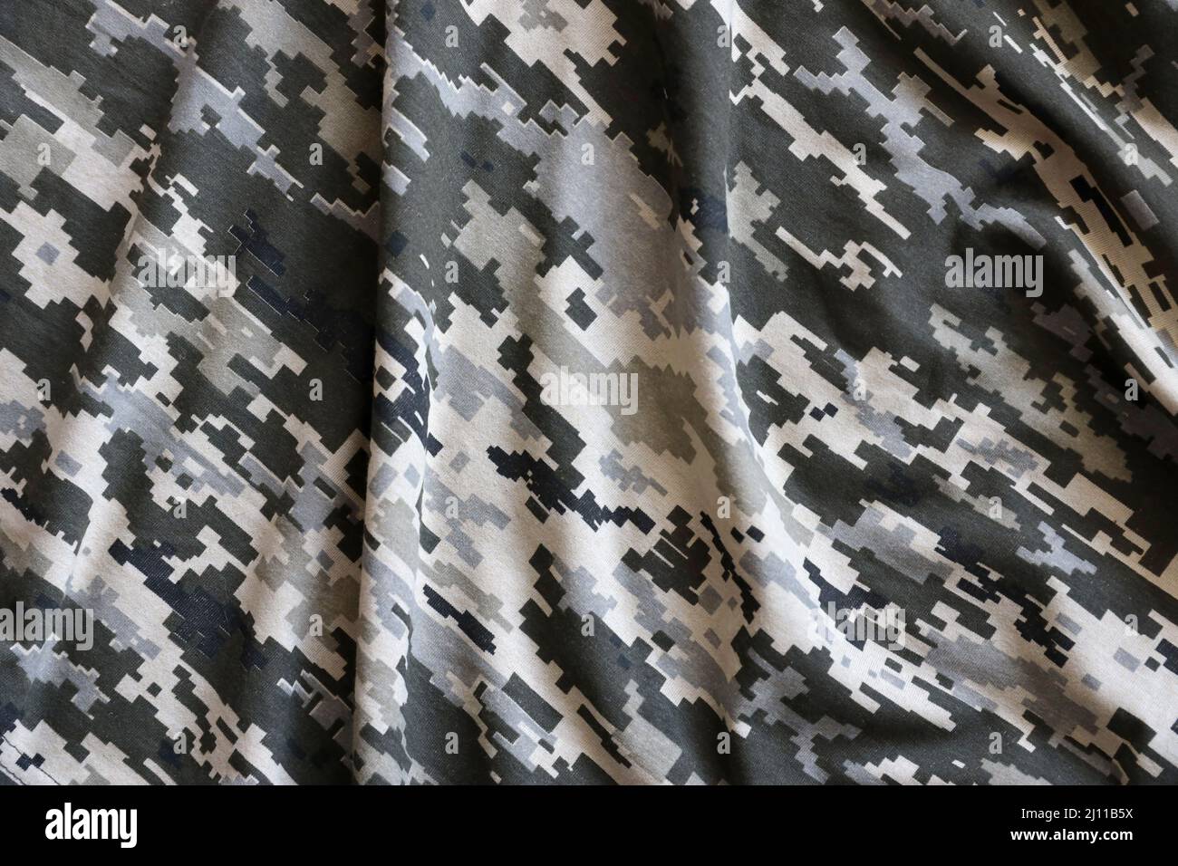 Fabric with texture of Ukrainian military pixeled camouflage. Cloth ...