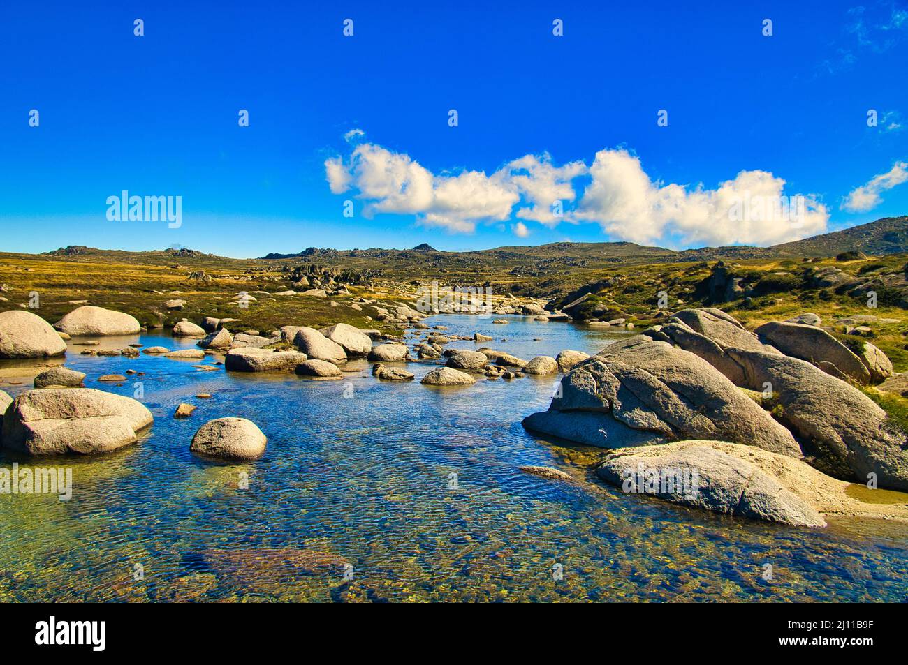 Crystal clear water of the Snowy River, in the mountains of Kosciuszko ...