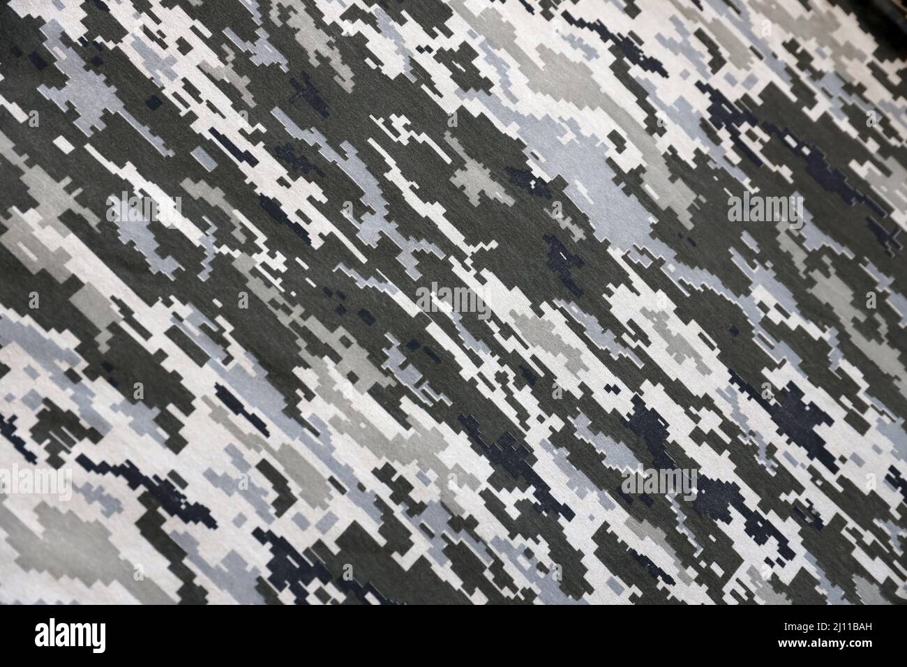 Fabric with texture of Ukrainian military pixeled camouflage. Cloth ...