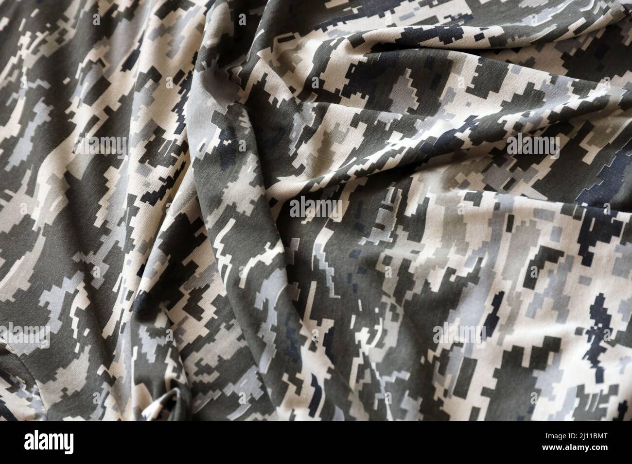 Fabric with texture of Ukrainian military pixeled camouflage. Cloth ...