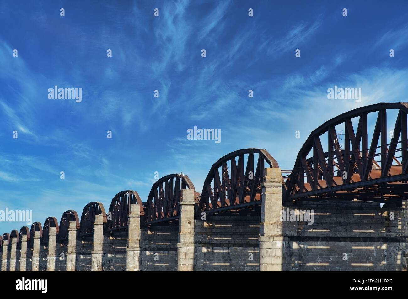 old rusty steel railway bridge with arches in dömitz germany Stock ...