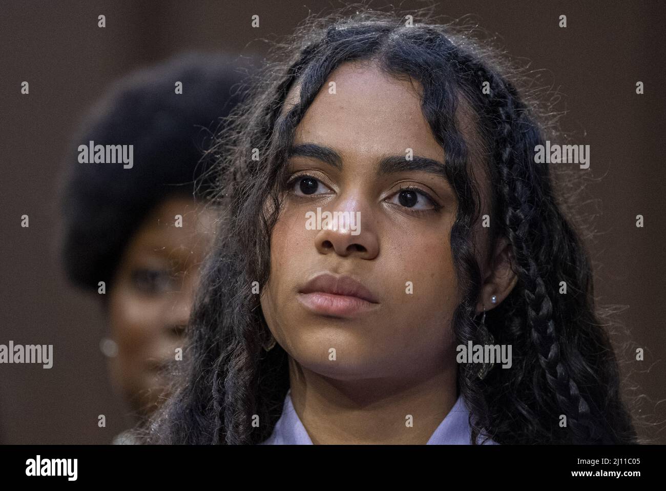 Washington, United States. 21st Mar, 2022. Leila Jackson listens to ...