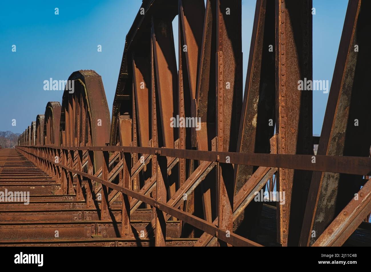 old rusty steel railway bridge with arches in dömitz germany Stock ...