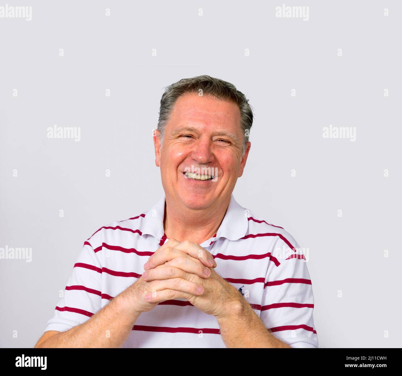 portrait of positive smiling mature man Stock Photo - Alamy