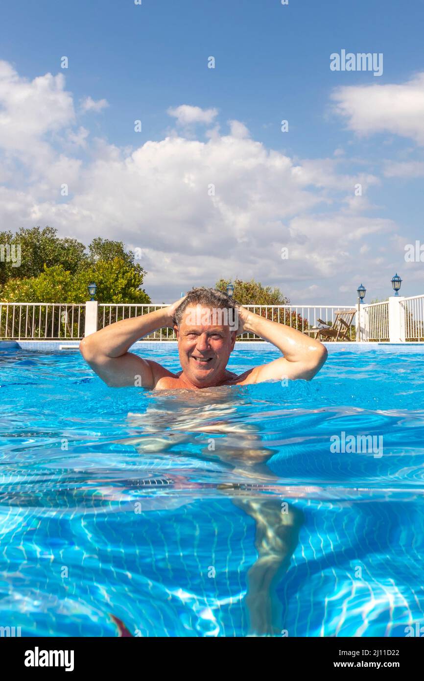 Senior man pool swimming hi-res stock photography and images - Alamy