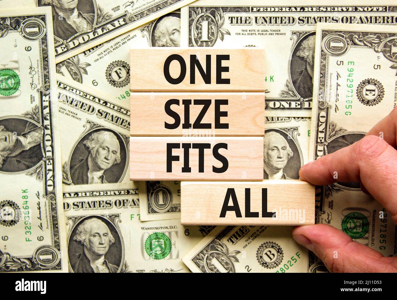 One size fits all symbol. Concept words One size fits all on wooden ...