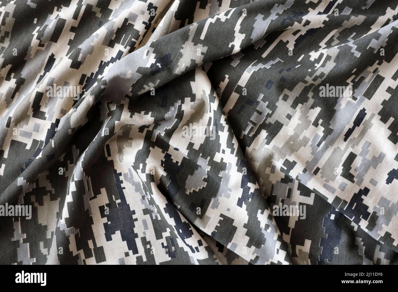 Fabric with texture of Ukrainian military pixeled camouflage. Cloth ...