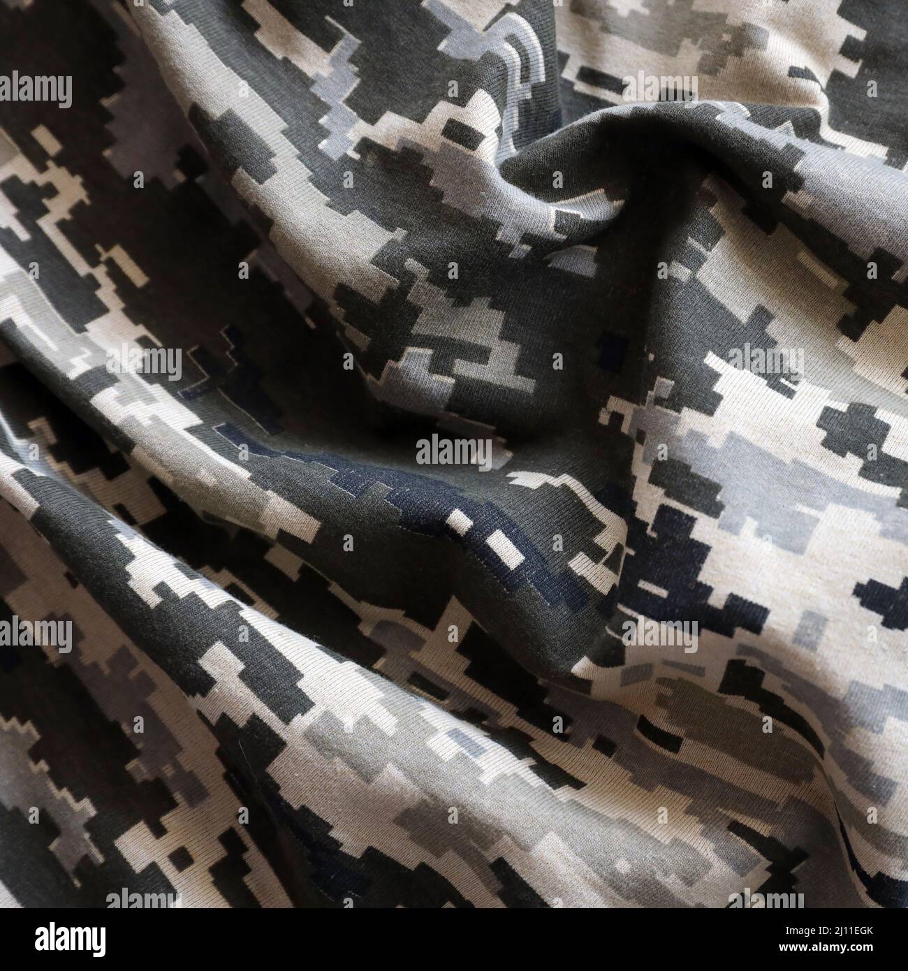 Fabric with texture of Ukrainian military pixeled camouflage. Cloth ...