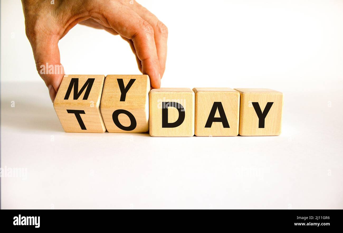 Today is my day symbol. Businessman turns wooden cubes and changes ...