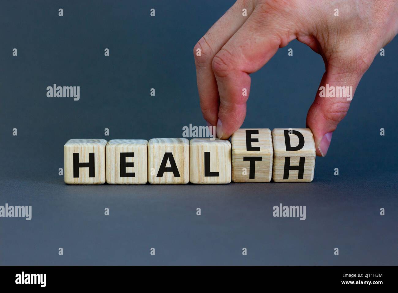 Healed health symbol. Doctor turns wooden cubes and changes concept ...