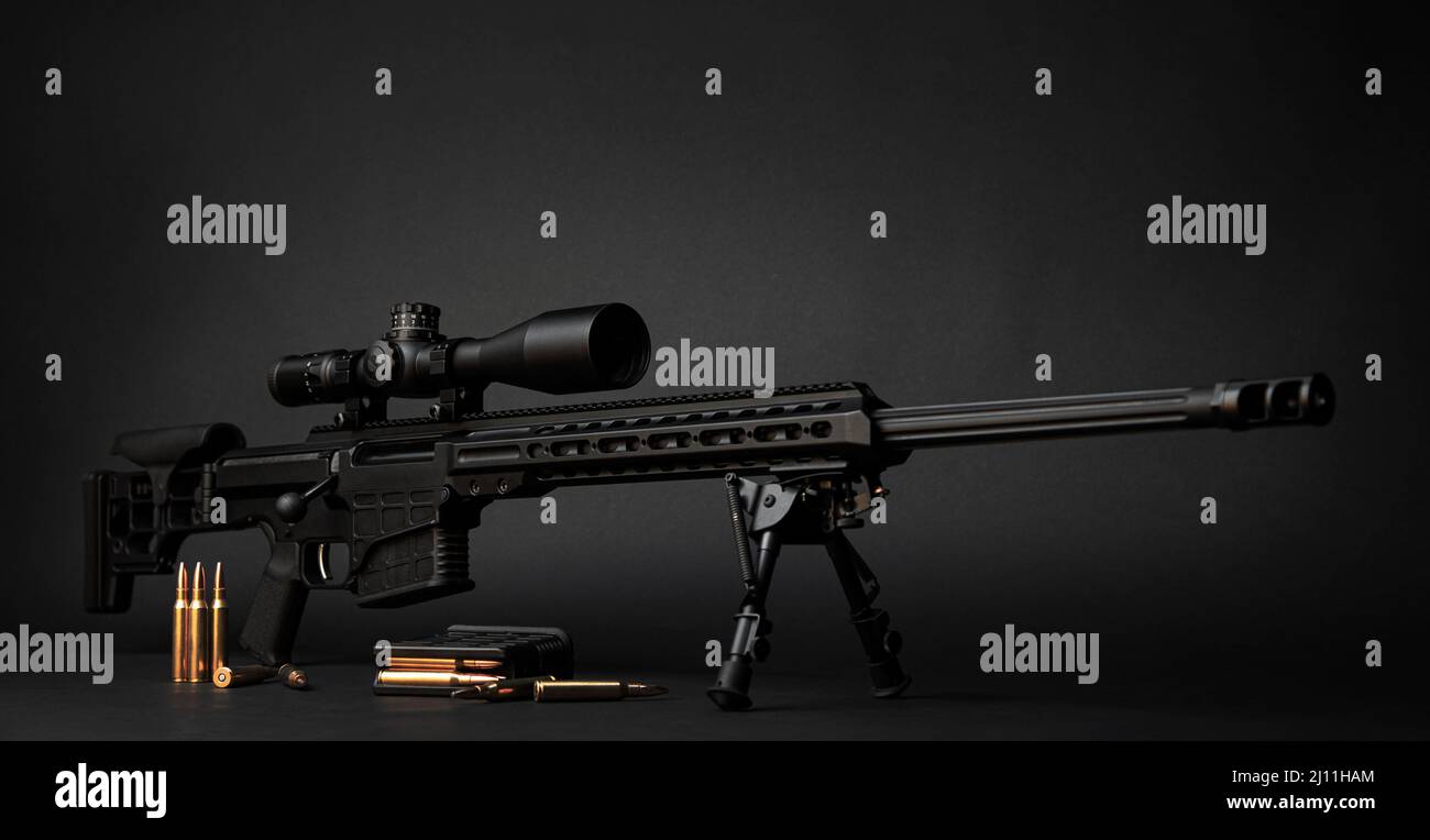 Modern powerful sniper rifle with a telescopic sight mounted on a bipod ...