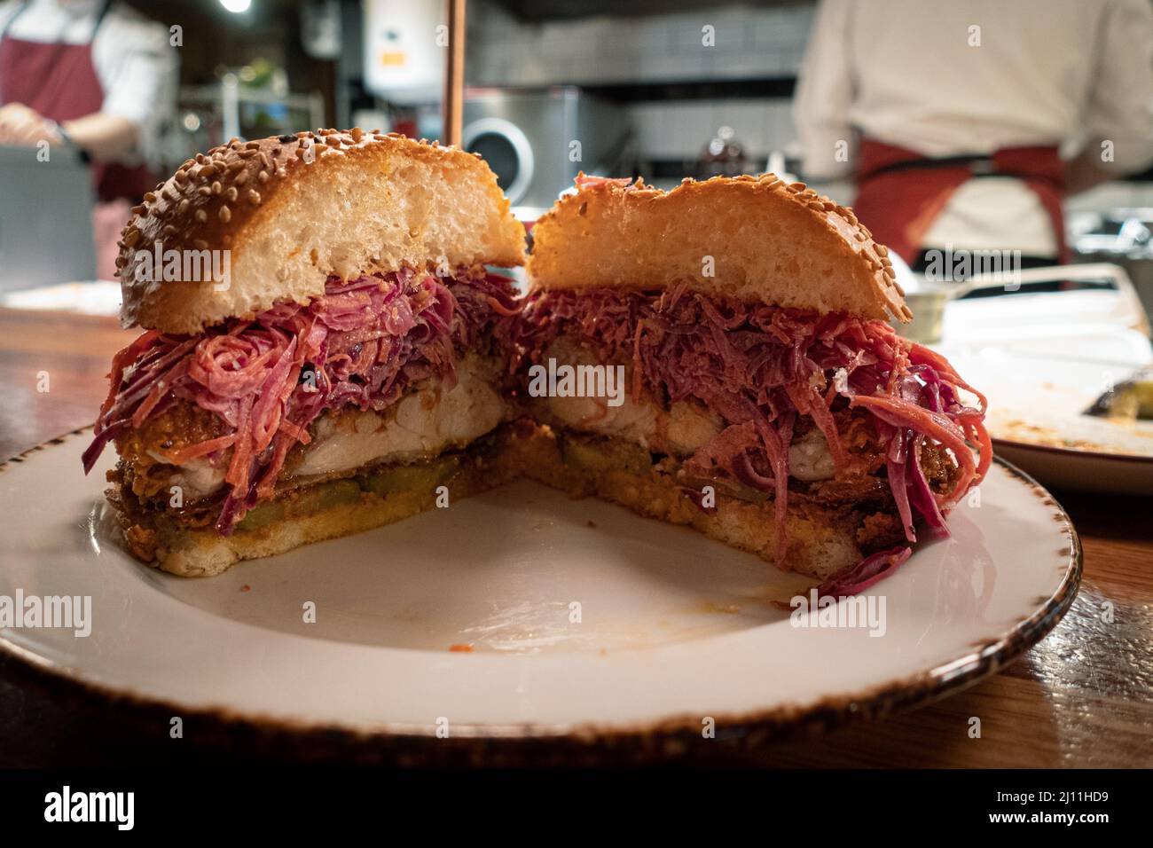 Close-up shot of a tasty sliced big meat burger Stock Photo - Alamy