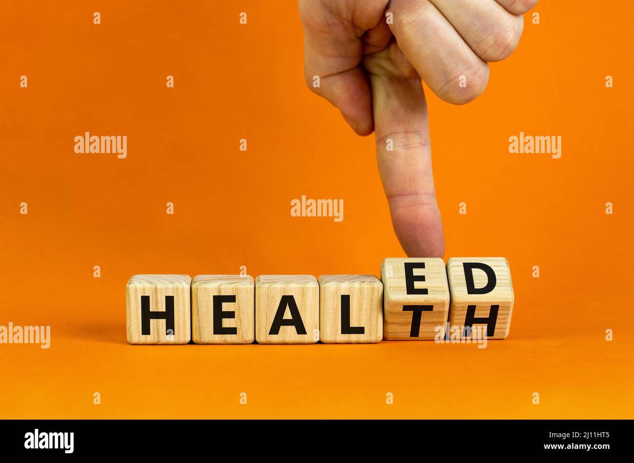 Healed health symbol. Doctor turns wooden cubes and changes concept ...