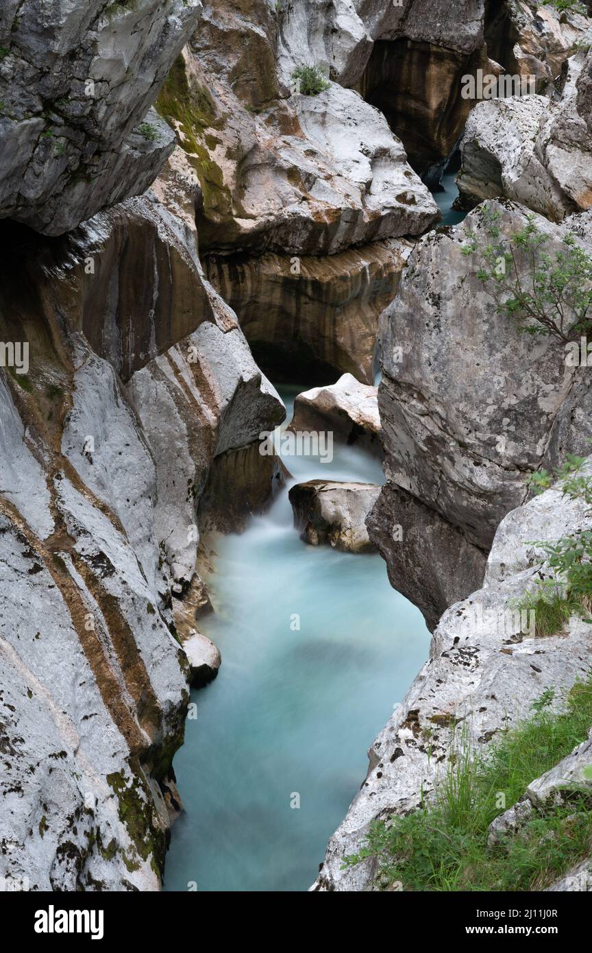 Blurred image of beautiful big gorge of soca river. View from above ...