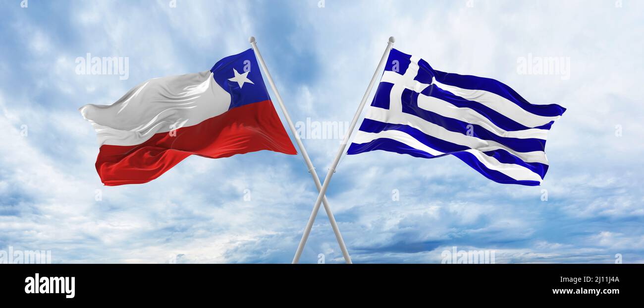 crossed national flags of Chile and Greece flag waving in wind at ...
