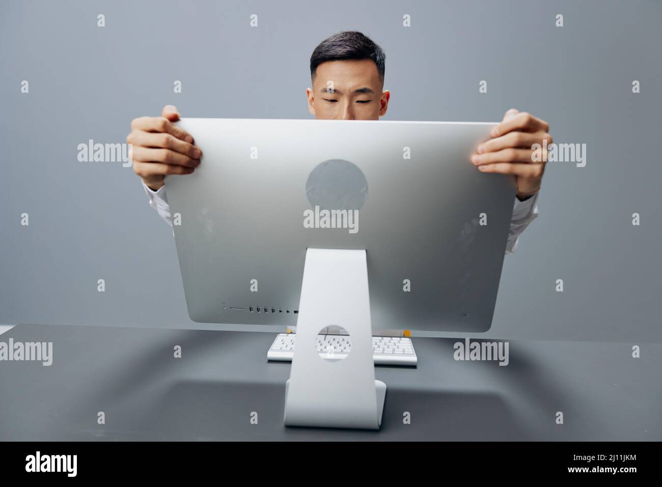 worker in a white shirt computer fatigue office isolated background ...