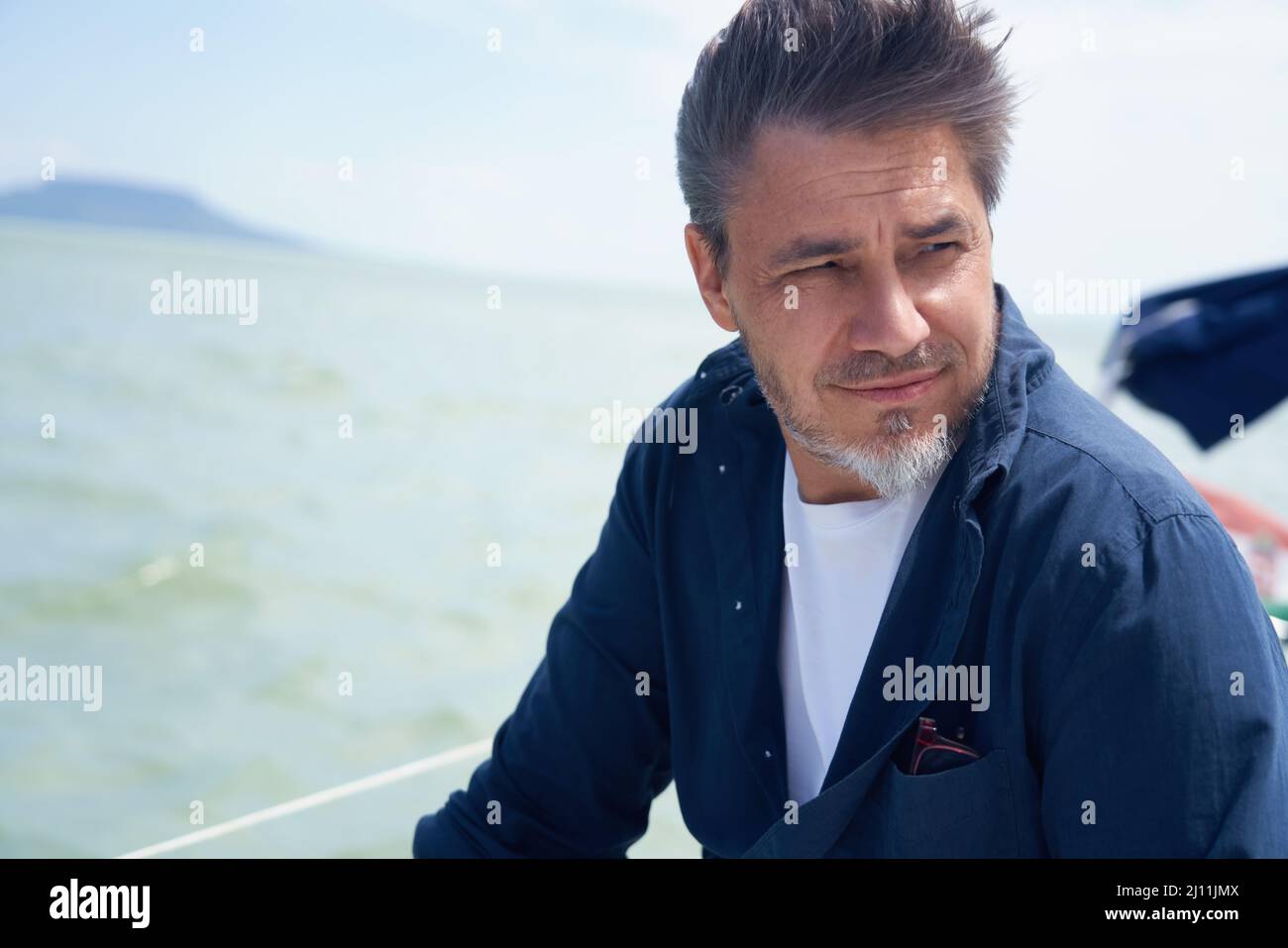 Portrait of mature age, middle age, mid adult man in 50s, happy ...