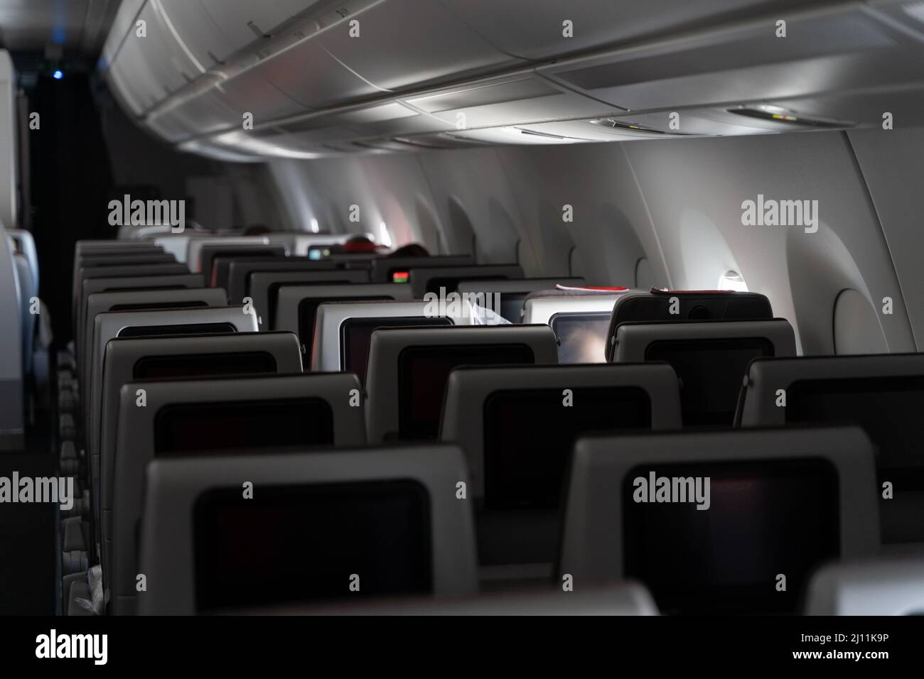 Overhead compartment hi-res stock photography and images - Alamy