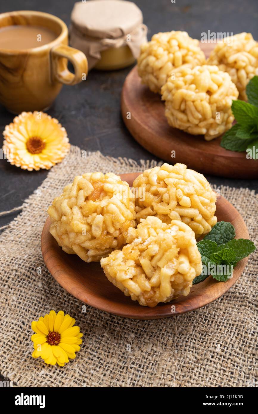 Traditional Tatar candy chak-chak made of dough and honey with cup of ...