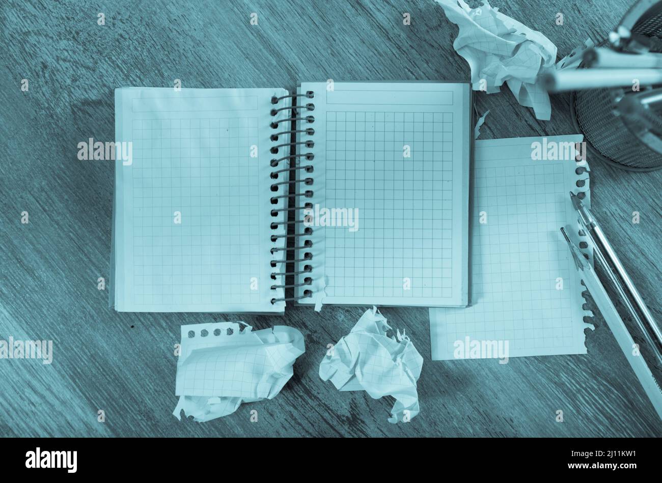 Crumpled pages and notebook Stock Photo - Alamy