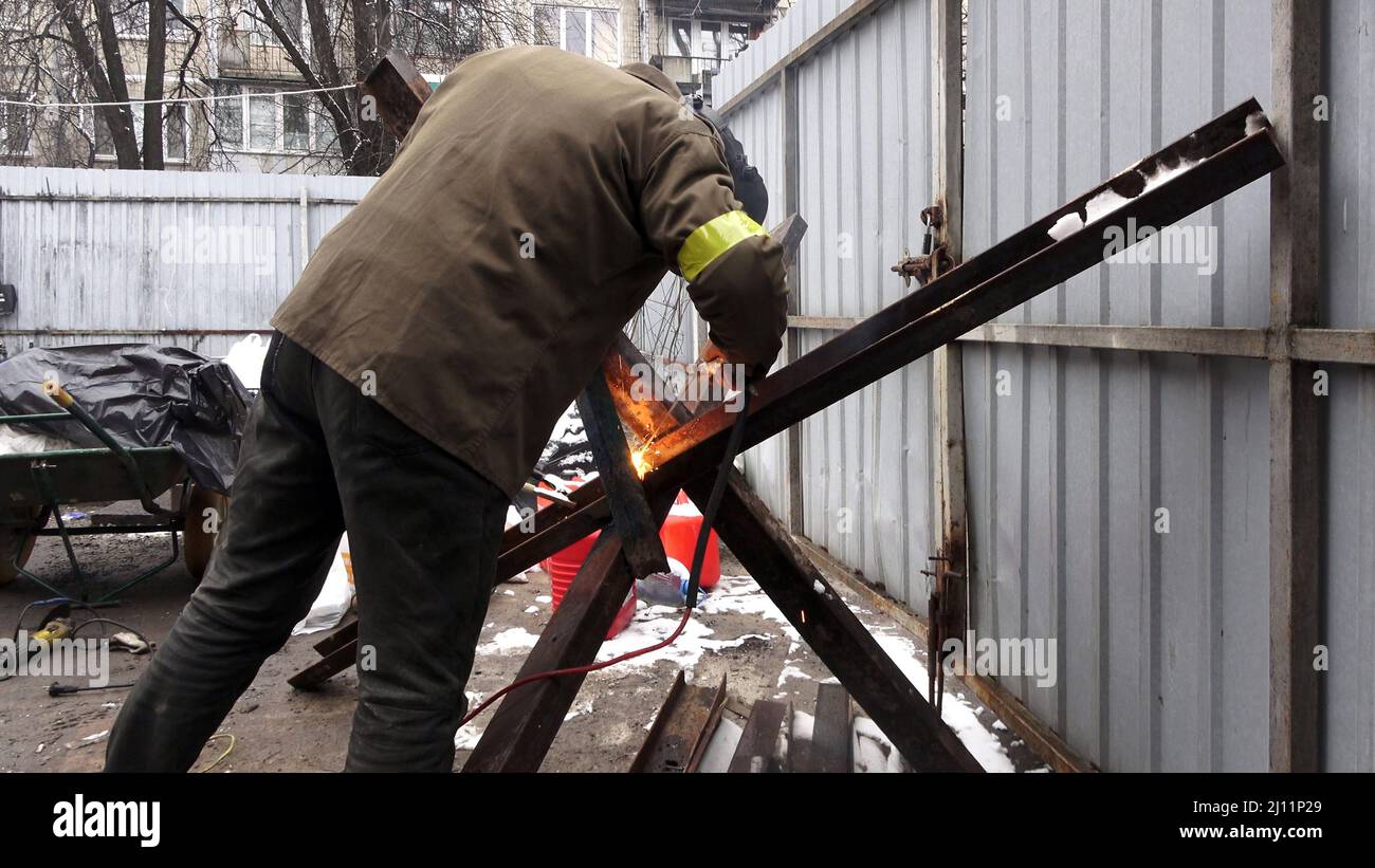 KYIV, UKRAINE 01 March. A member of Territorial defense forces makes ...