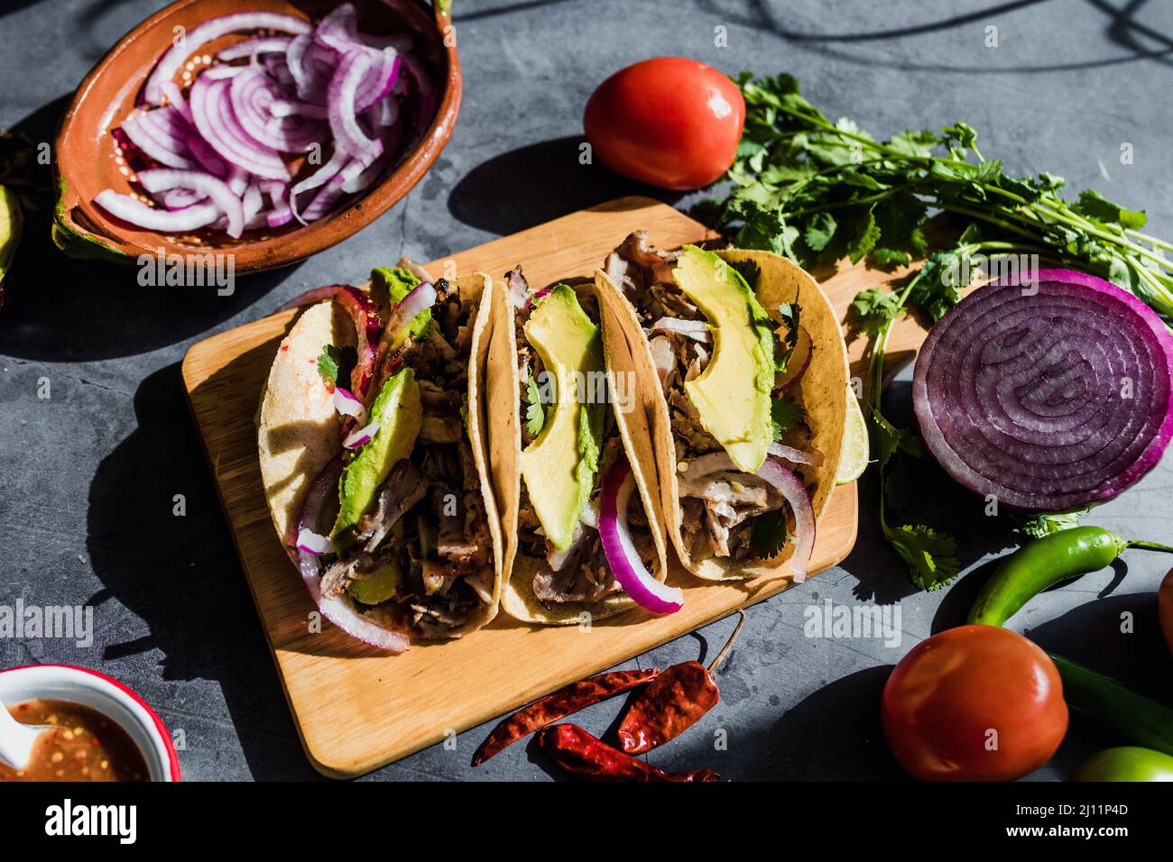 mexican street tacos with lemon, sauce, onion and cilantro Traditional ...