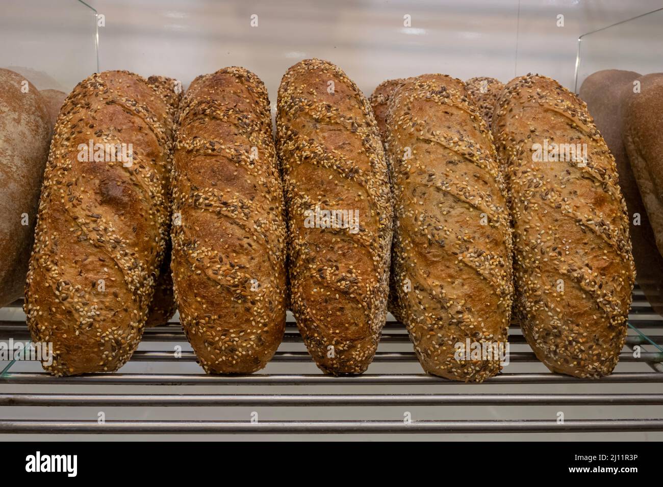 Artisan baker and pastry chef. Detail of breads in a bakery Stock Photo ...