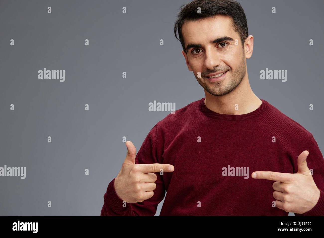 handsome man in a sweater posing emotions elegant style cropped view ...