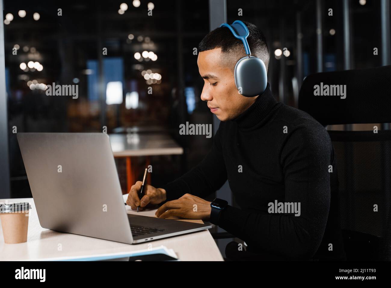 Distance education for Asian student. Handsome filipino studying online ...