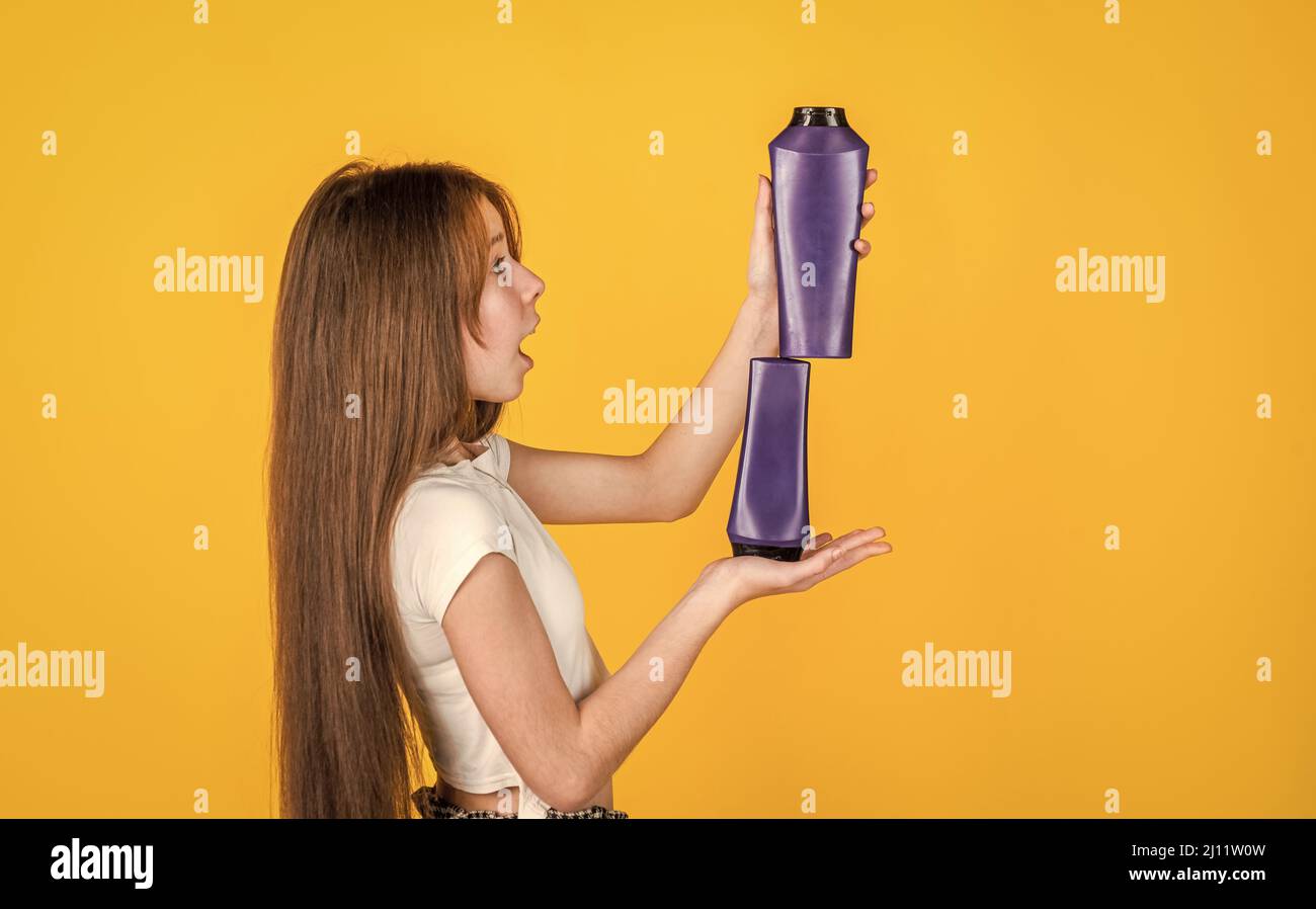 teen girl wash long straight hair with shampoo and condirioner, beauty ...
