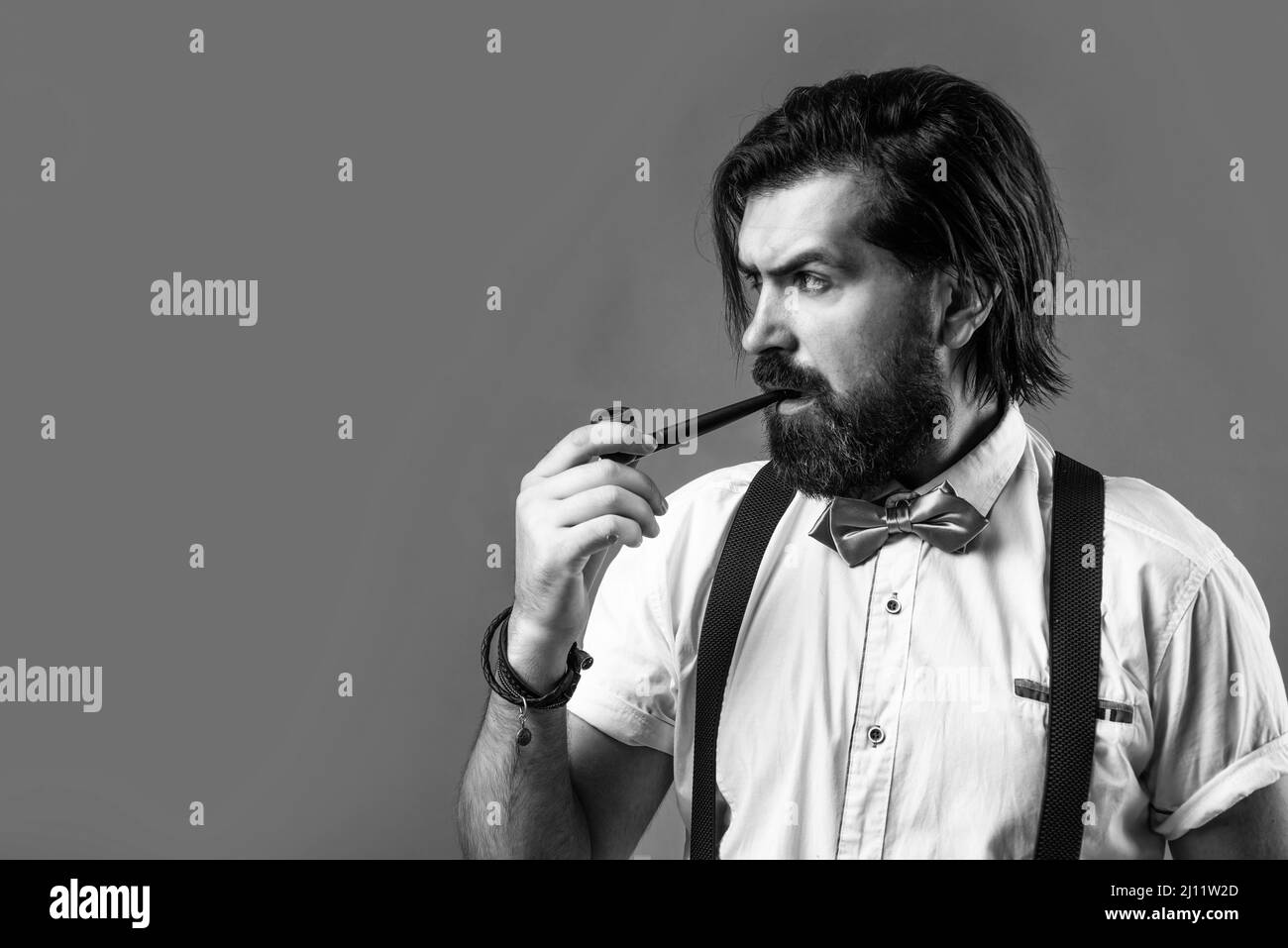 Guy smoking pipe Black and White Stock Photos & Images - Alamy