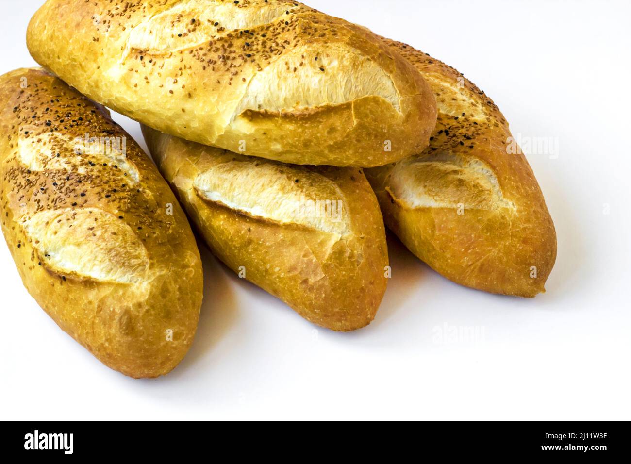 Traditional Turkish Breads with sesame and black cumin on a white ...