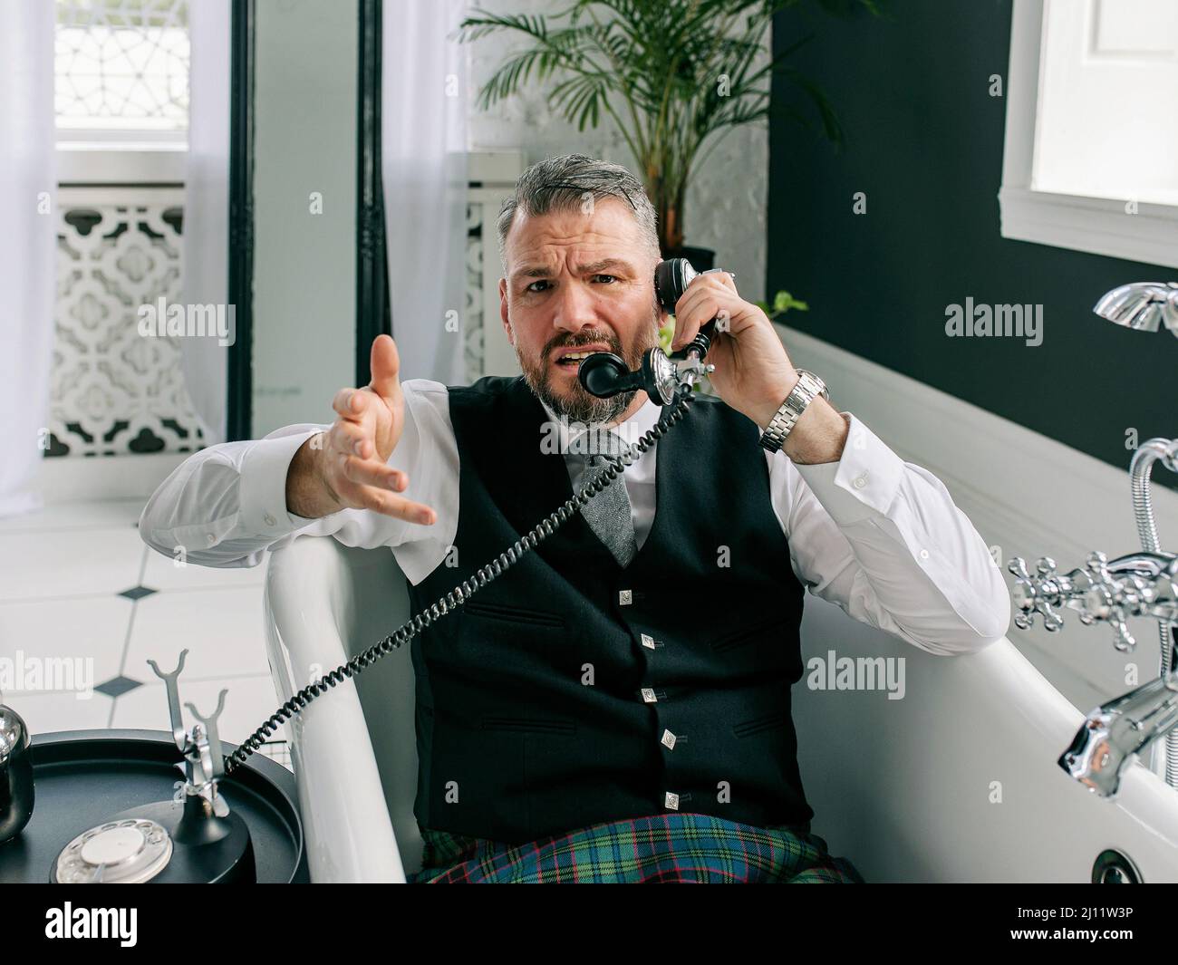 handsome mature courageous stylish man scotsman in kilt and suit ...