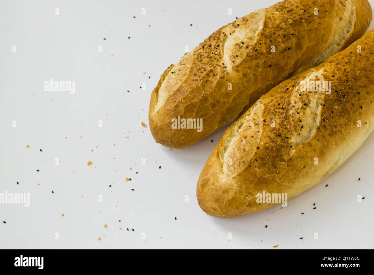 Traditional Turkish Breads with sesame and black cumin on a white ...