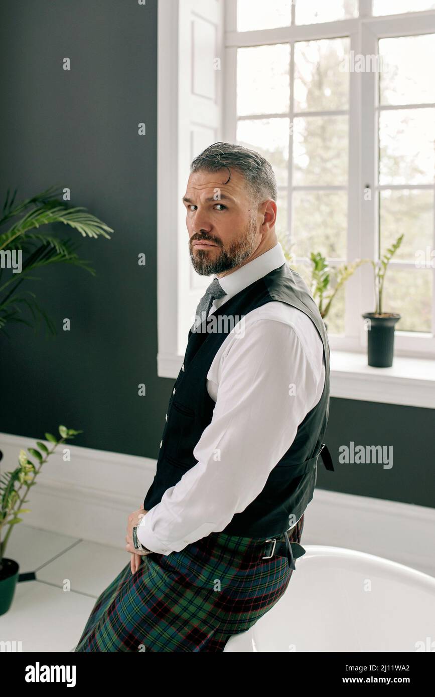 handsome mature courageous stylish scotsman businessman in kilt and ...