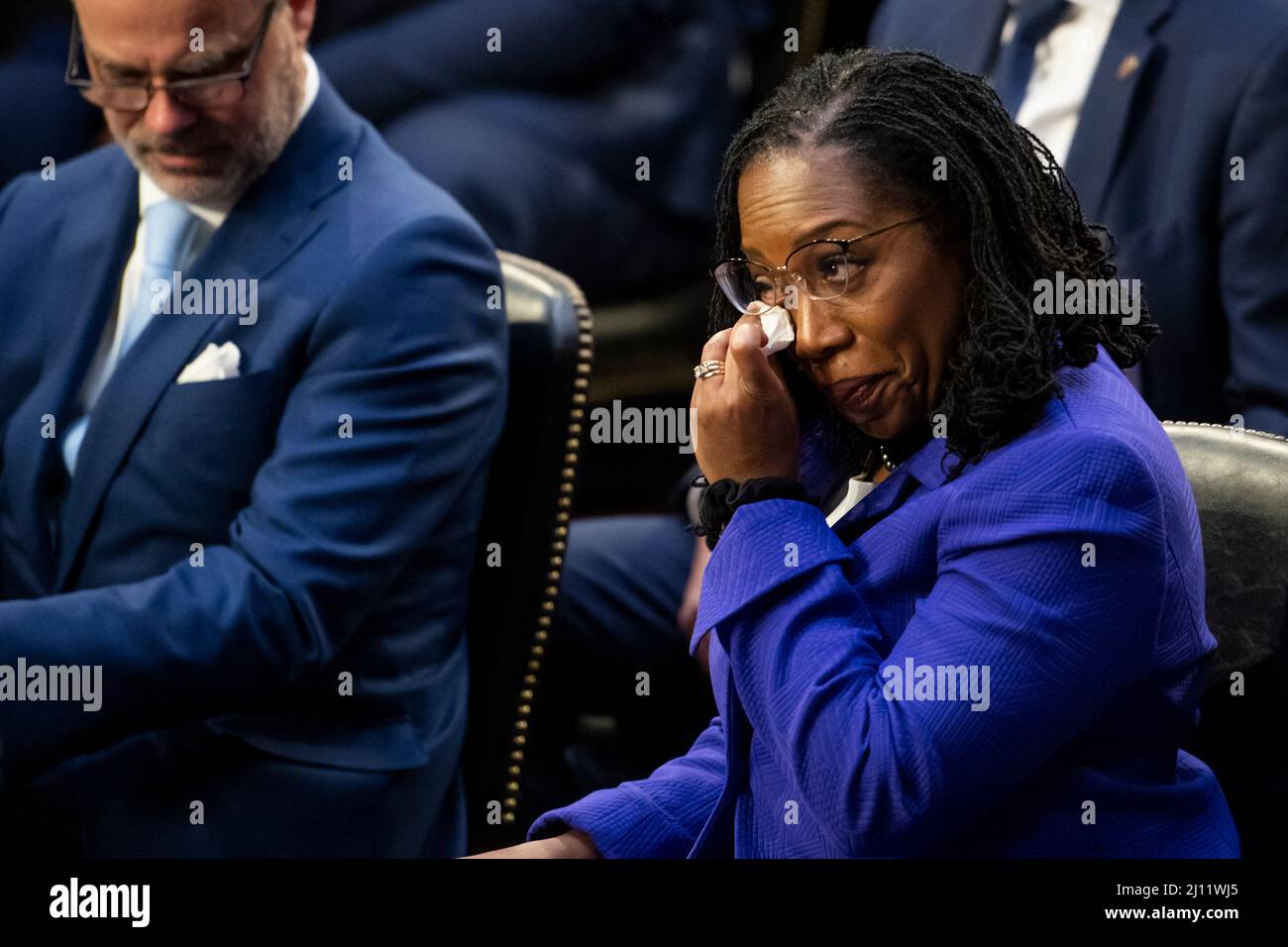 As her husband Patrick Jackson, left, looks on, Judge Ketanji Brown ...