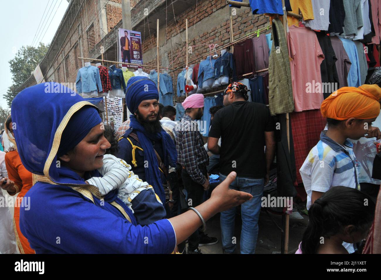People attend the Hola Mohalla Color Festival in Anandpur Saheb Punjabi ...