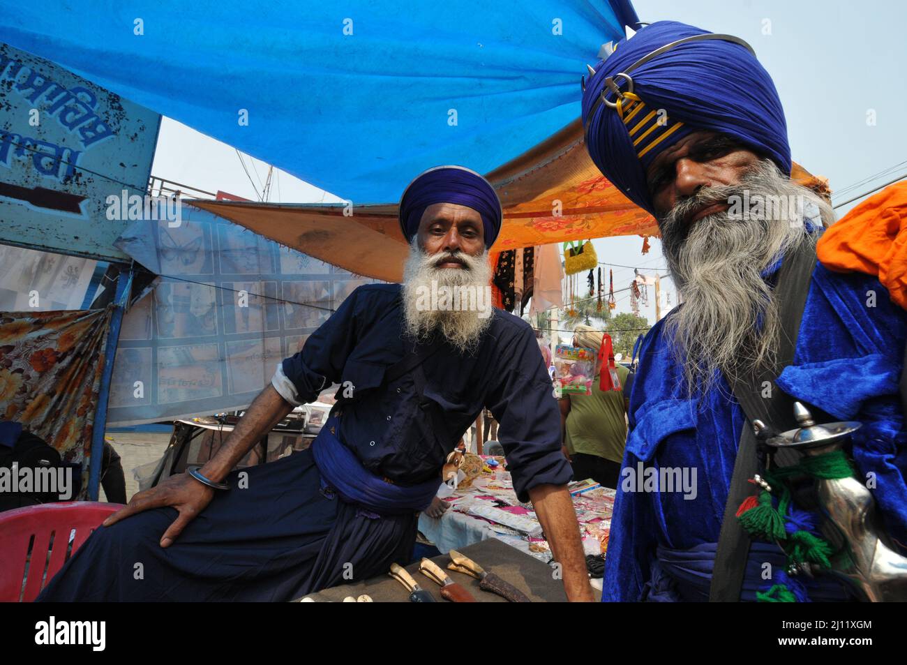 People attend the Hola Mohalla Color Festival in Anandpur Saheb Punjabi ...