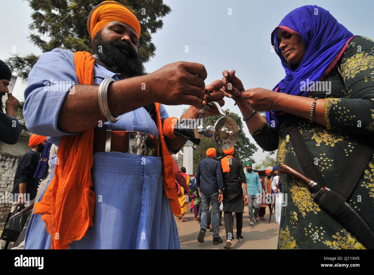 People attend the Hola Mohalla Color Festival in Anandpur Saheb Punjabi ...