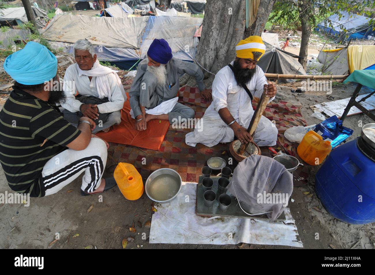 People attend the Hola Mohalla Color Festival in Anandpur Saheb Punjabi ...