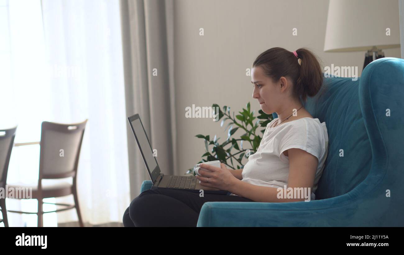 Authentic Stressful Woman working Chatting On Laptop Living Room ...