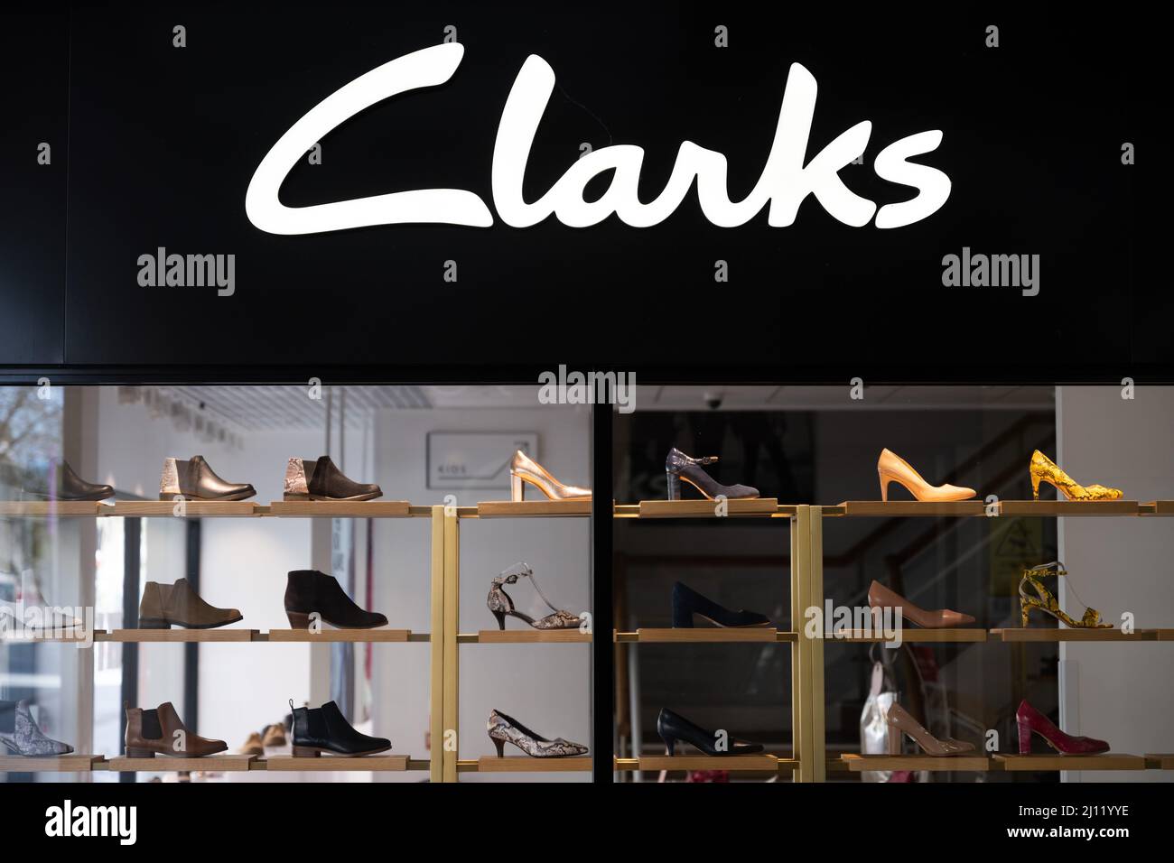 A close-up of a Clarks store sign Stock Photo - Alamy