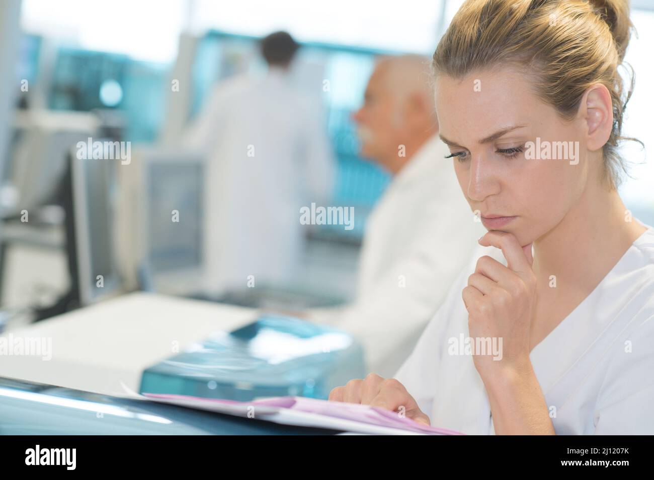 worried female doctor in hospital Stock Photo - Alamy