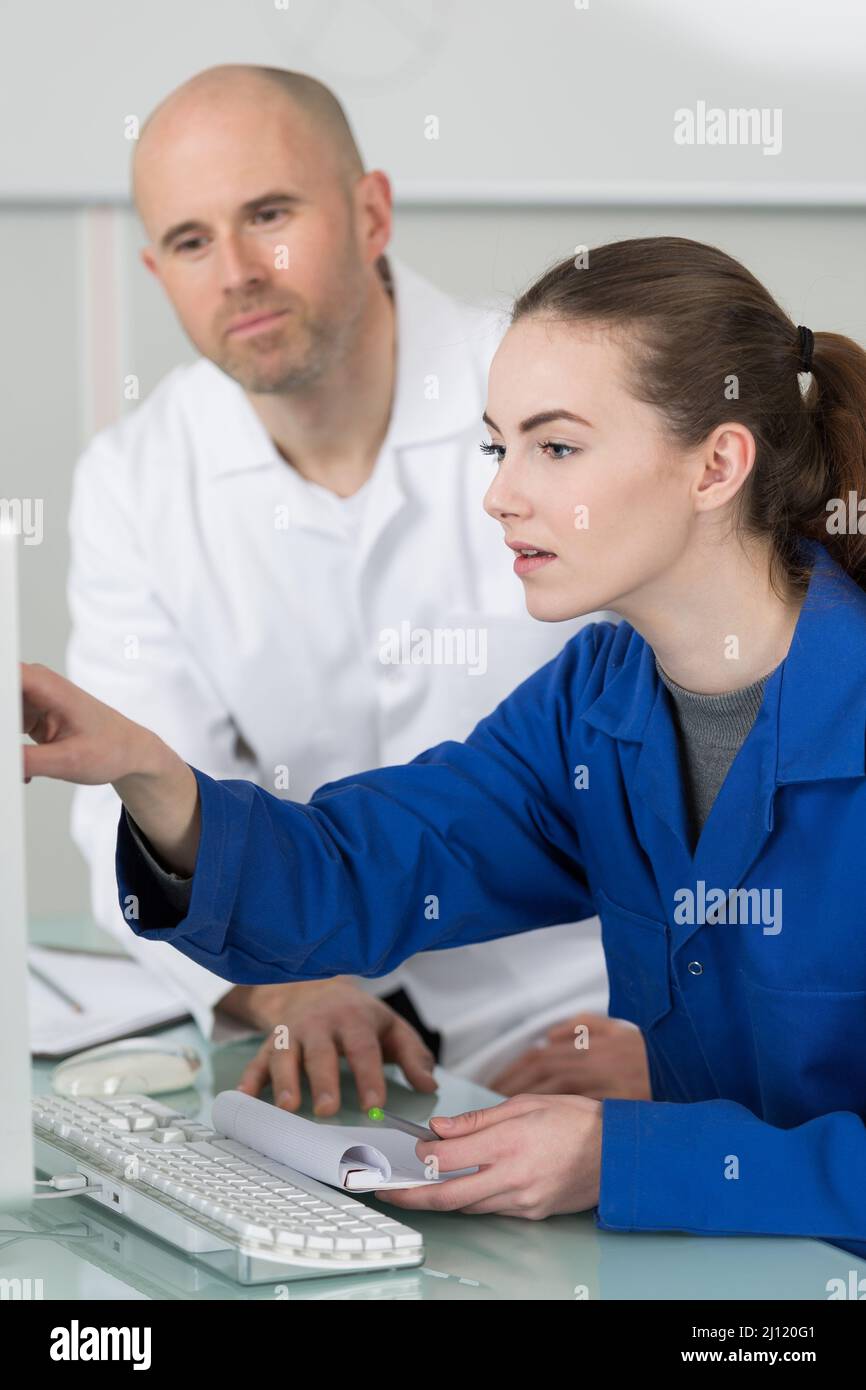 female student pointing at a screen Stock Photo - Alamy