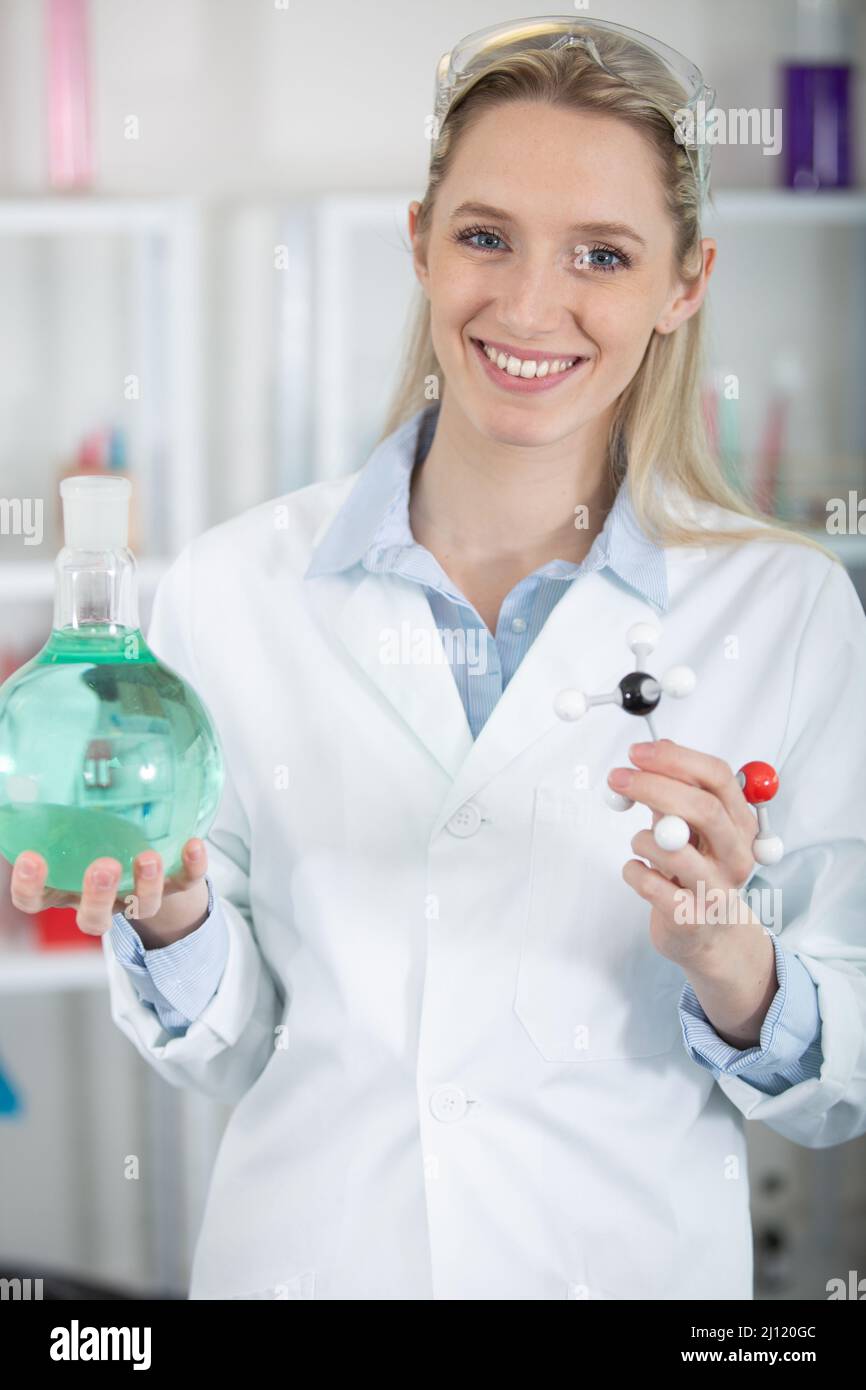 female scientist examining a three dimensional model of dna Stock Photo ...