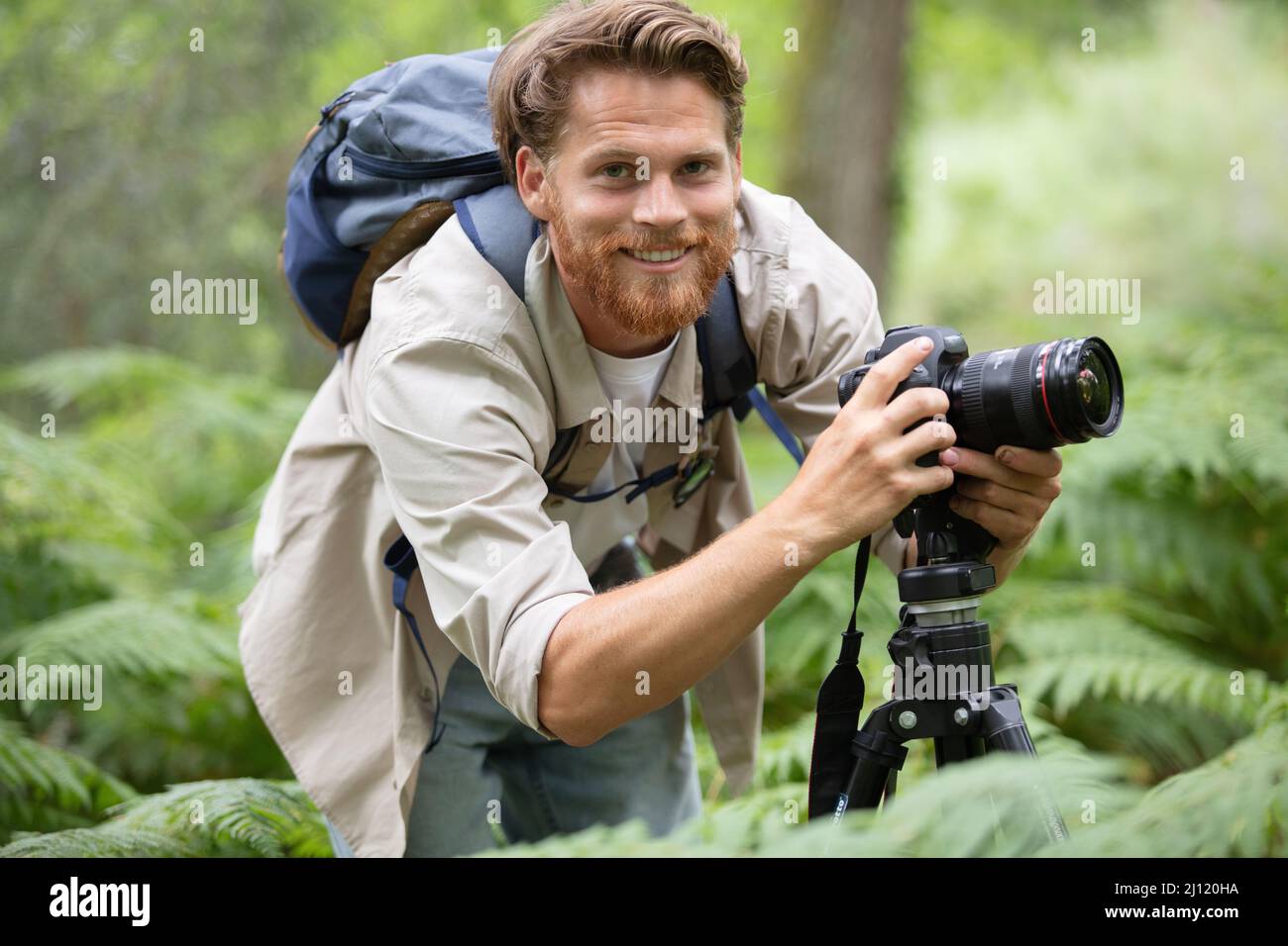 happy photographer in the jungle Stock Photo - Alamy