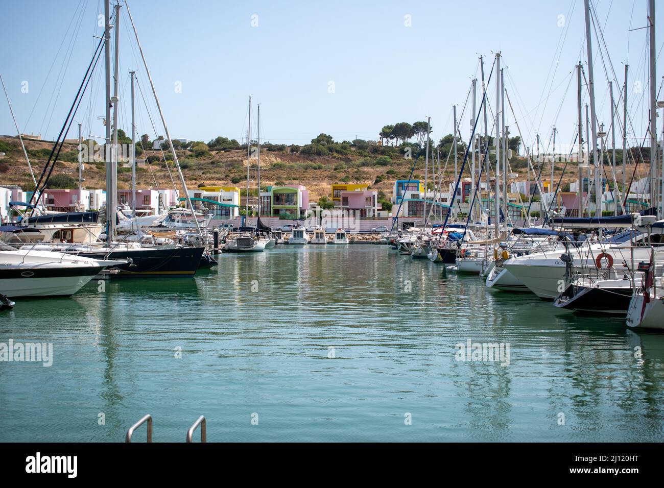Body of water near a port in Algarve, Portugal with several boats and ...